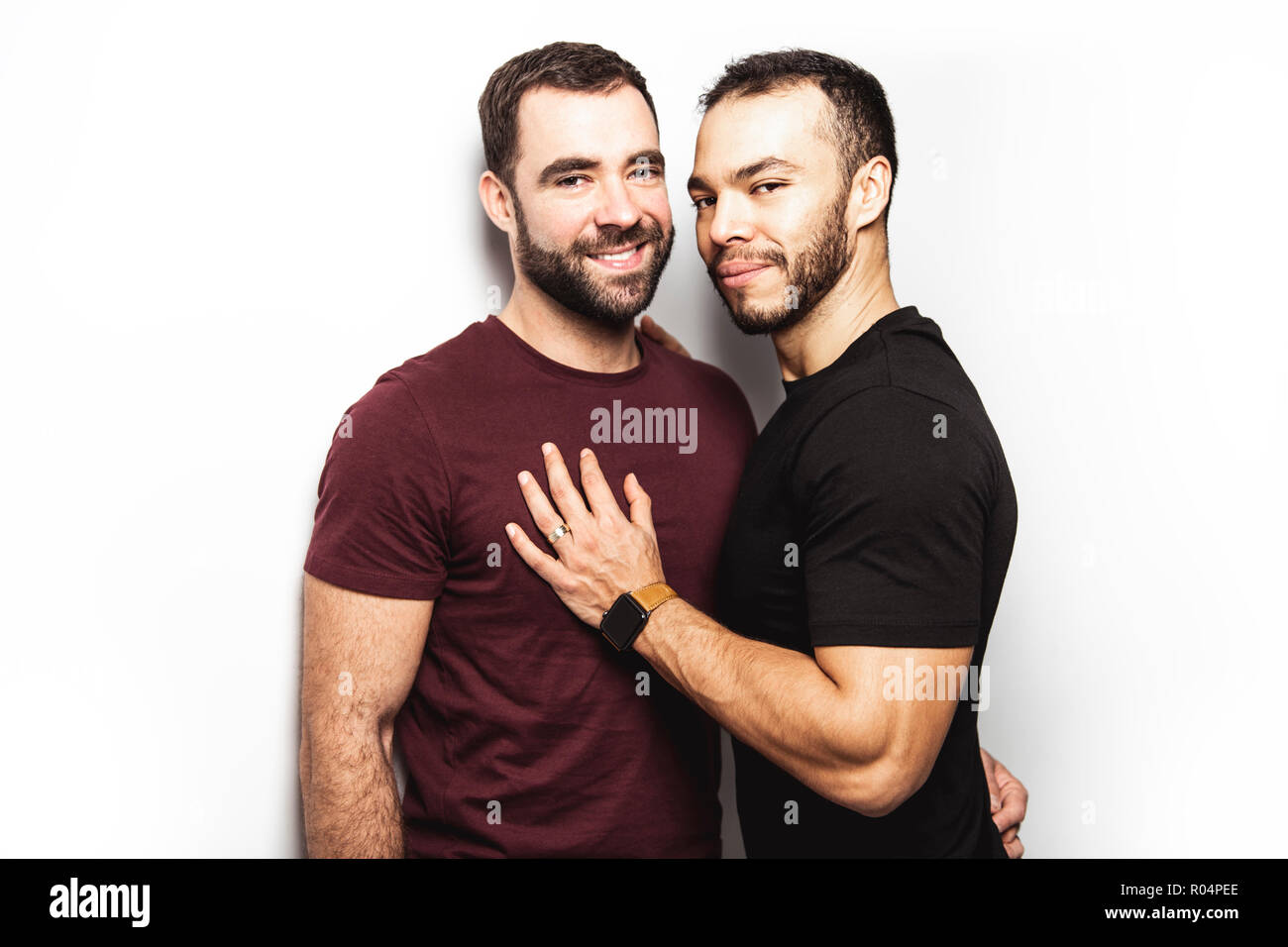Young Homosexuals Gay Couple Love Each Other On A White Background
