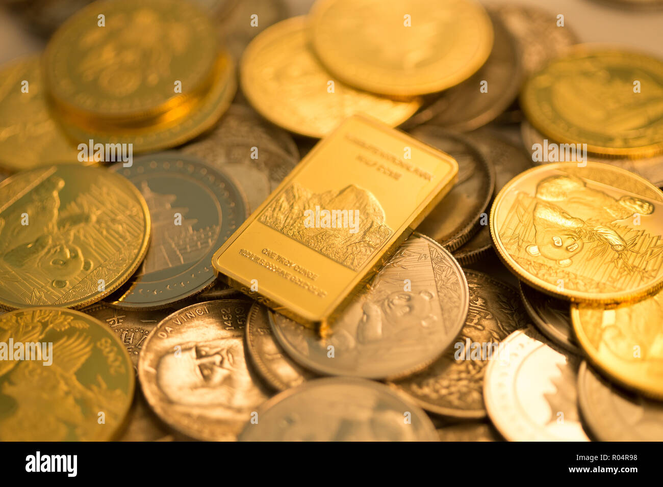 Gold COINS and gold bars Stock Photo - Alamy