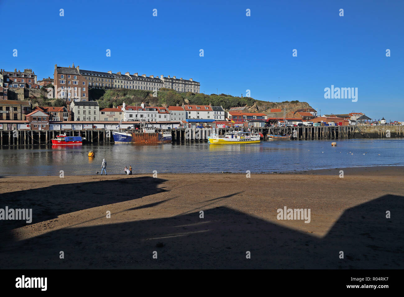 A view of Whitby, North Yorkshire, UK from the Old Town looking across ...
