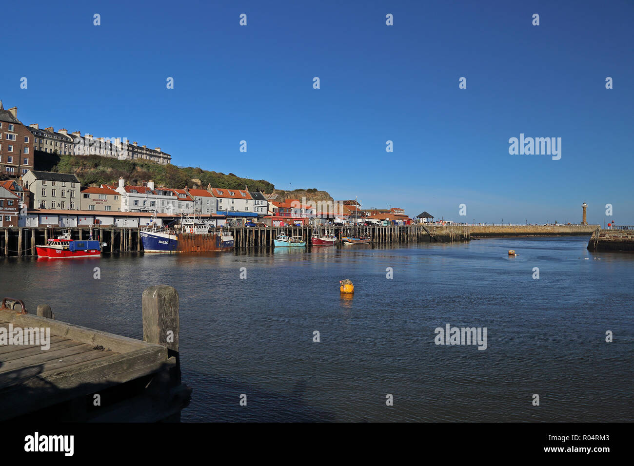 A view of Whitby, North Yorkshire, UK from the Old Town looking across ...