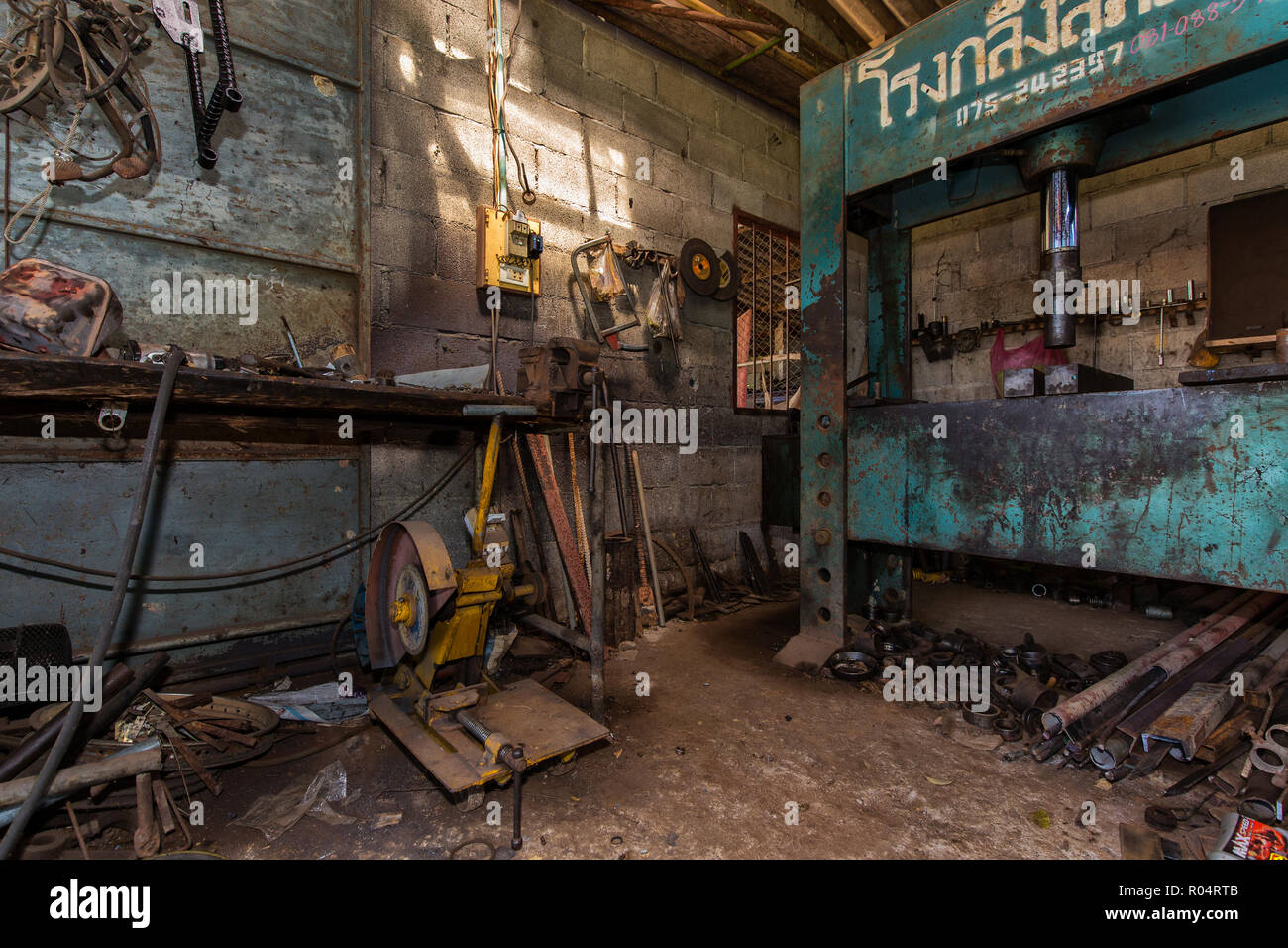 View inside a messy mechanical turner workshop Stock Photo - Alamy
