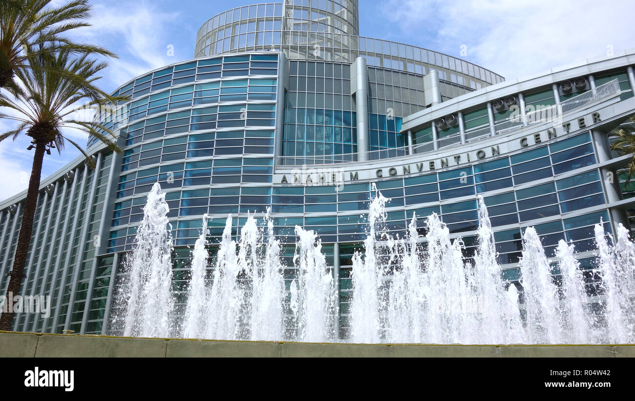 Beautiful palm trees frame an exterior view of the Anaheim Convention ...