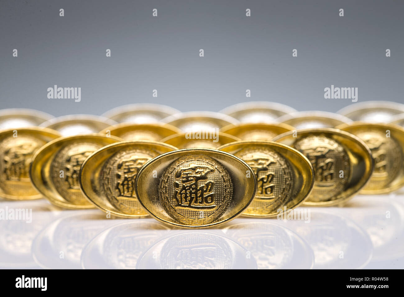 Gold ingot and silver treasure Stock Photo - Alamy