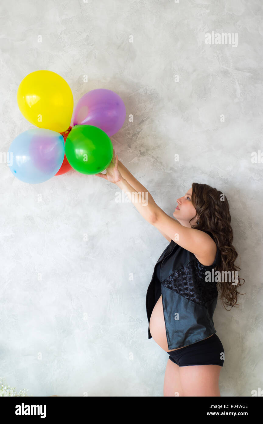 Pregnant woman balloons hi-res stock photography and images - Alamy