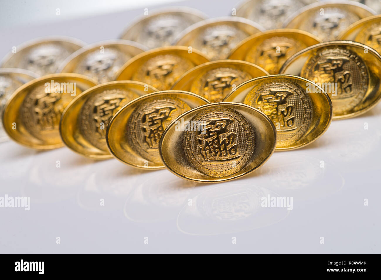 Gold ingot and silver treasure Stock Photo - Alamy