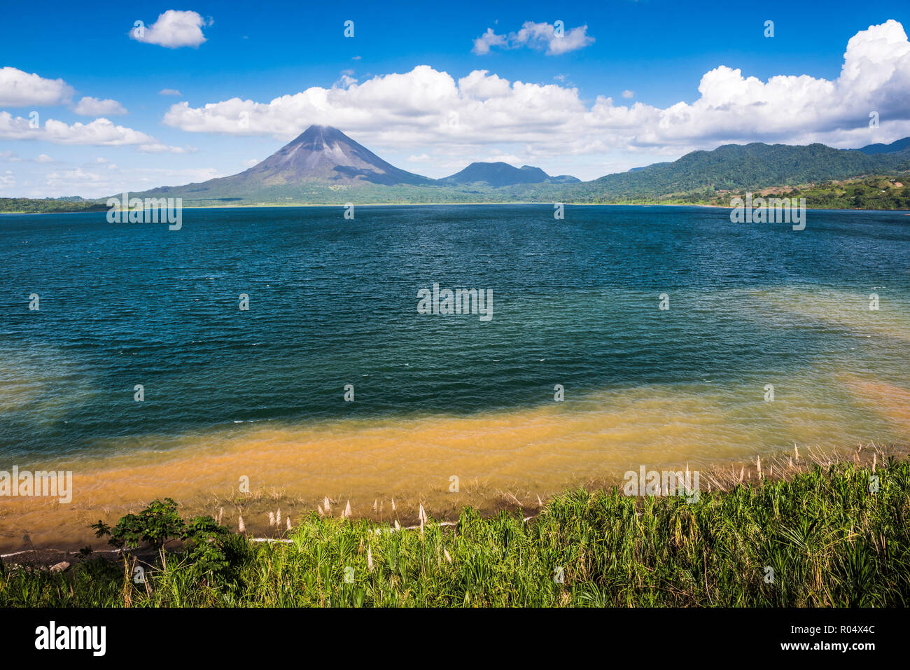 Arenal Volcano behind Laguna de Arenal (Arenal Lake), Alajuela Province ...