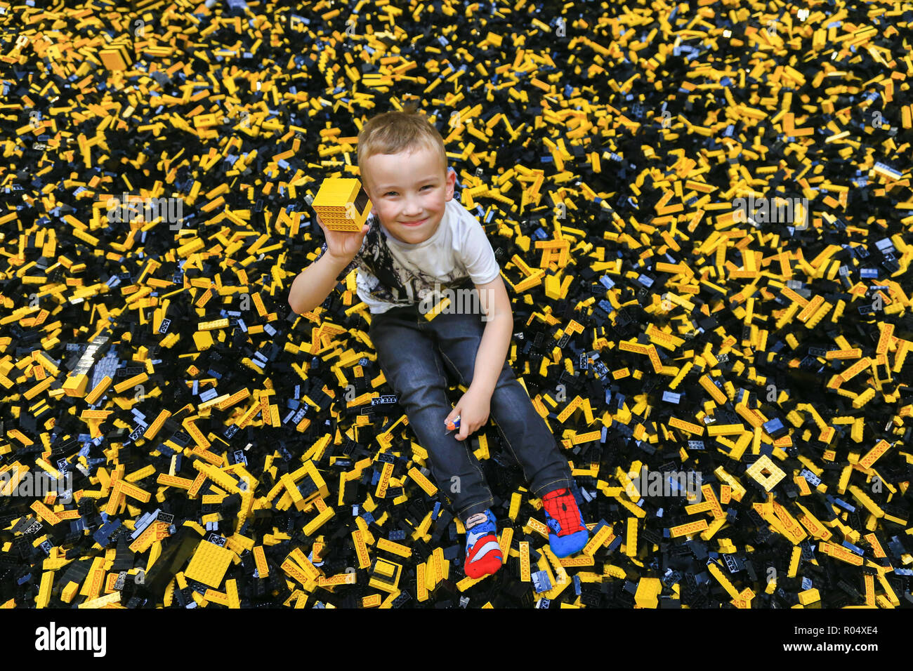 Lego boy playing with hi-res stock photography and images - Alamy