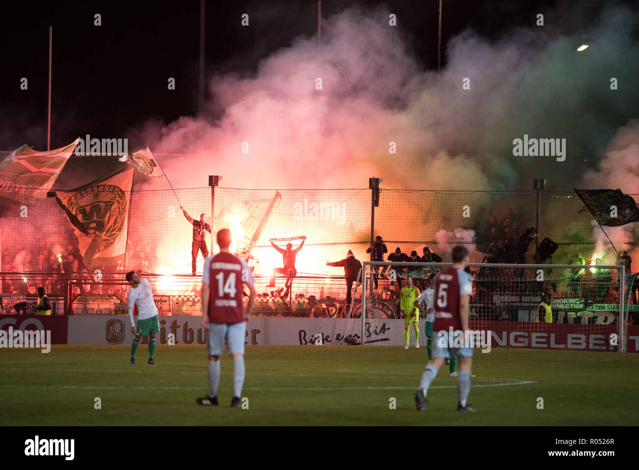 Luebeck, Deutschland. 31st Oct, 2018. Bremer fans return at the ...