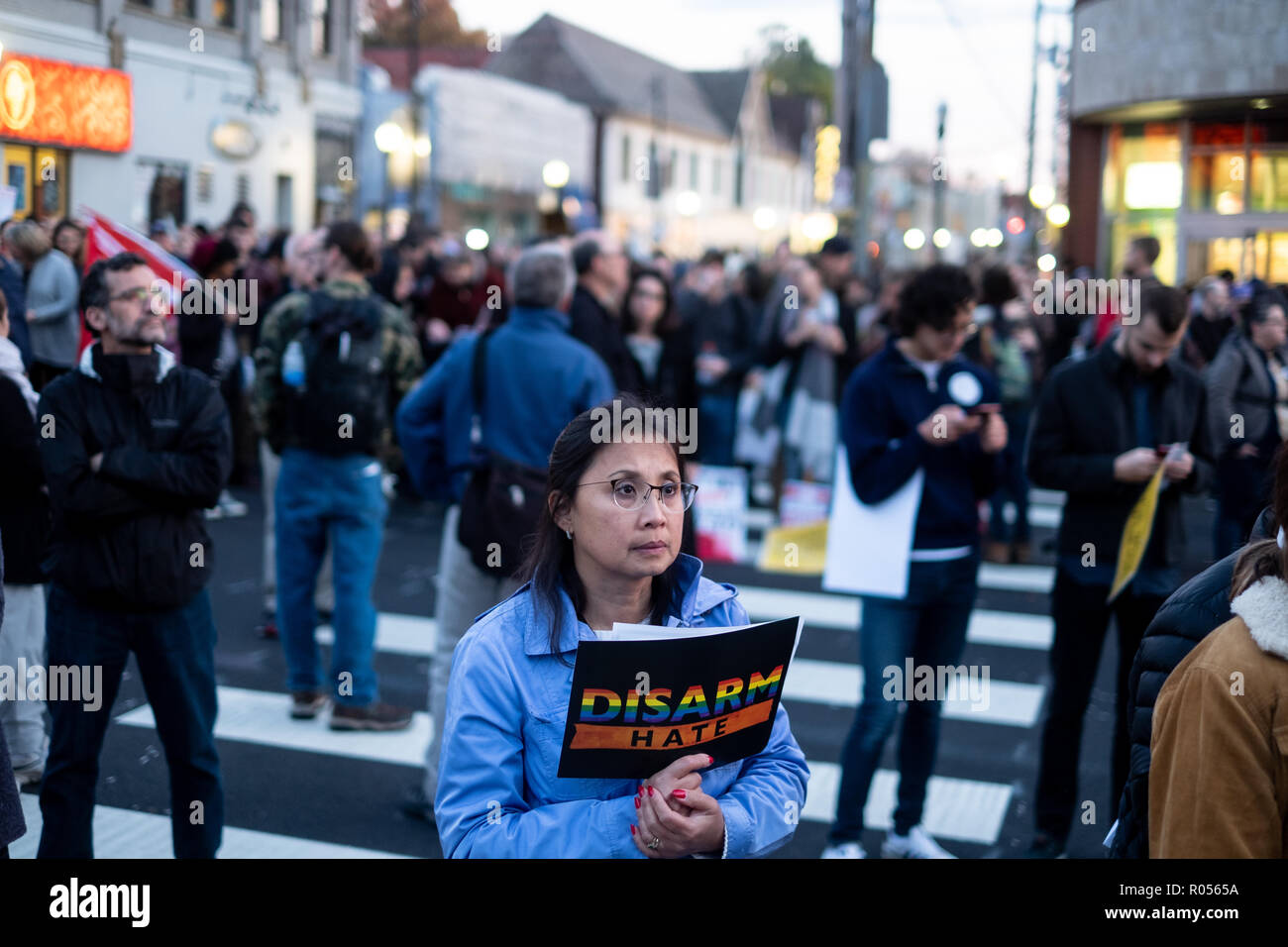 Disarm hate protest sign hi-res stock photography and images - Alamy