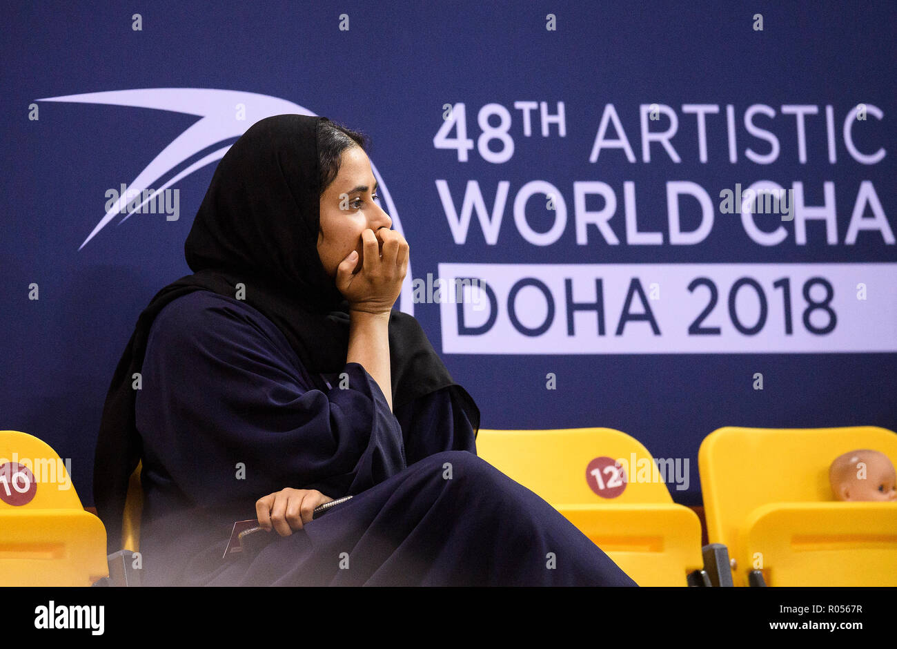 Doha, Katar. 01st Nov, 2018. Arab woman, spectator in front of World ...