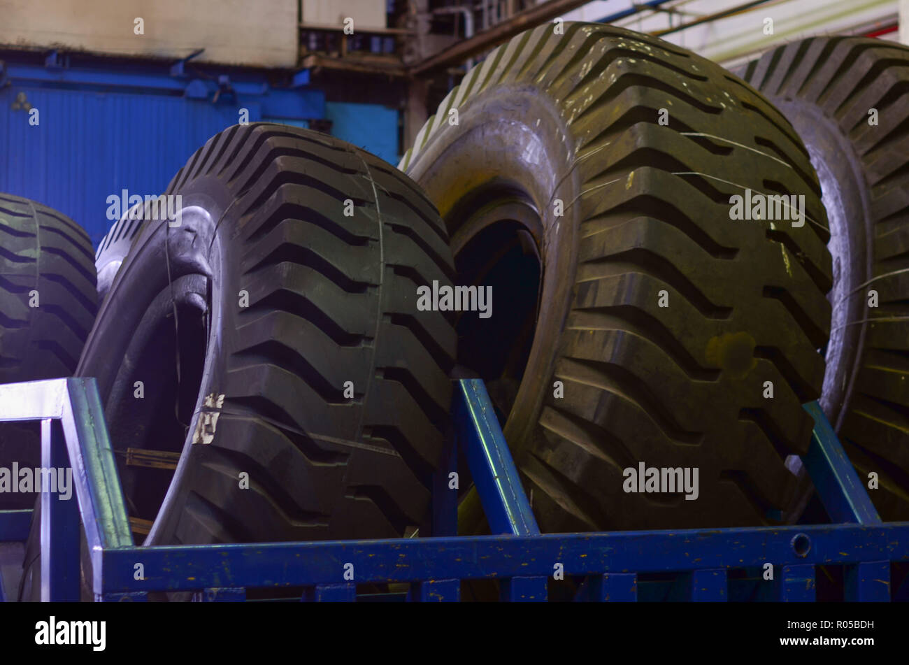 The protector of a large rubber wheel. Huge rubber tire career dump ...