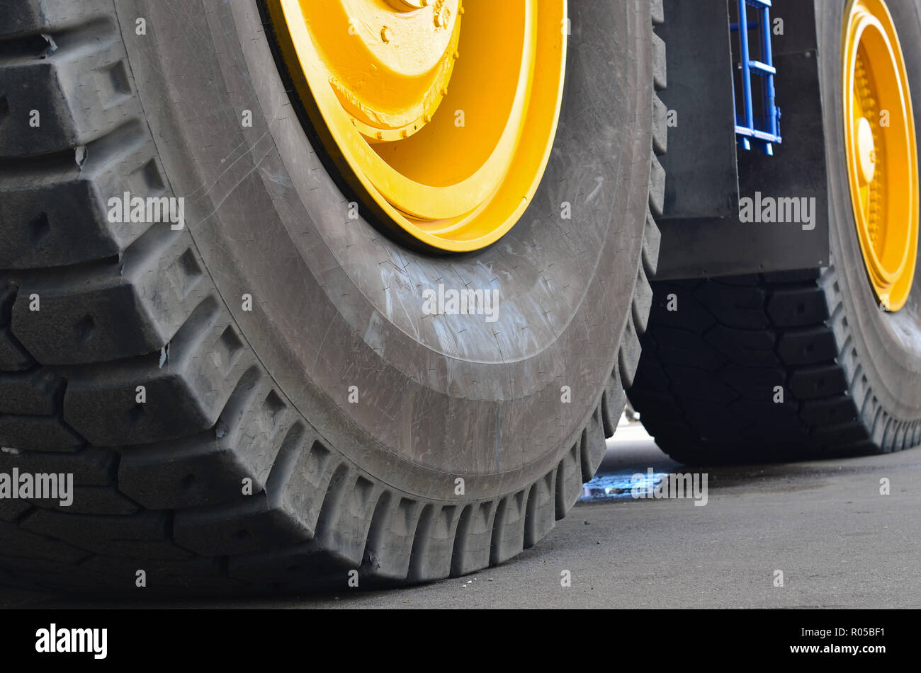 The protector of a large rubber wheel. Huge rubber tire career dump ...