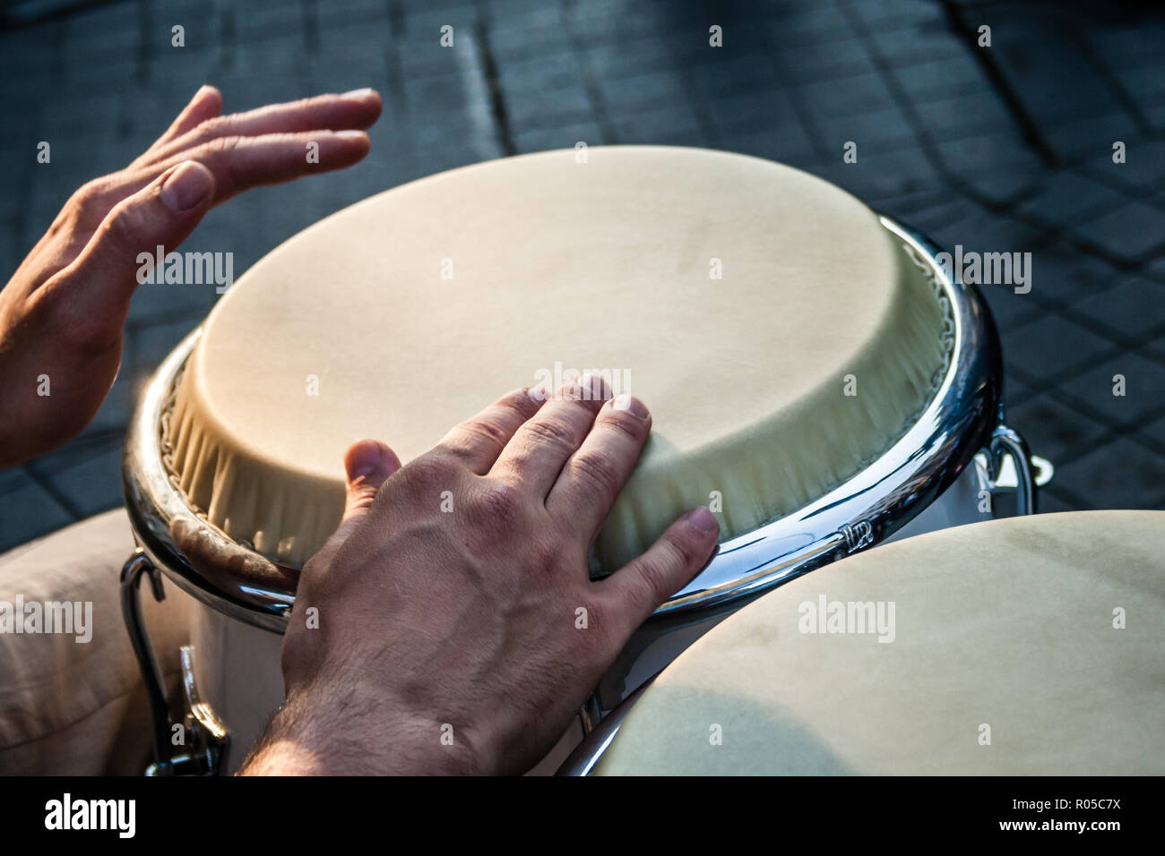 Hands of a musician playing the percussion musical instrument Stock ...