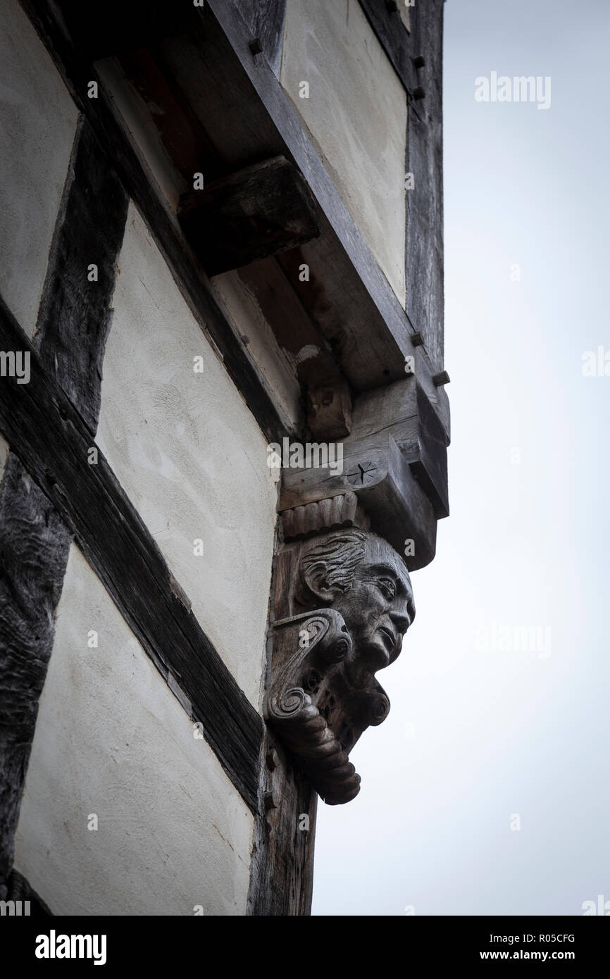 Carved wooden head on an old timber framed building in Ludlow Stock ...