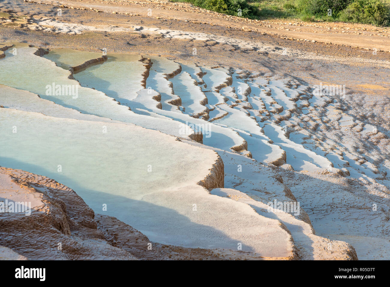 Travertine terrace at sunset near Orost, one of the rare pure ...