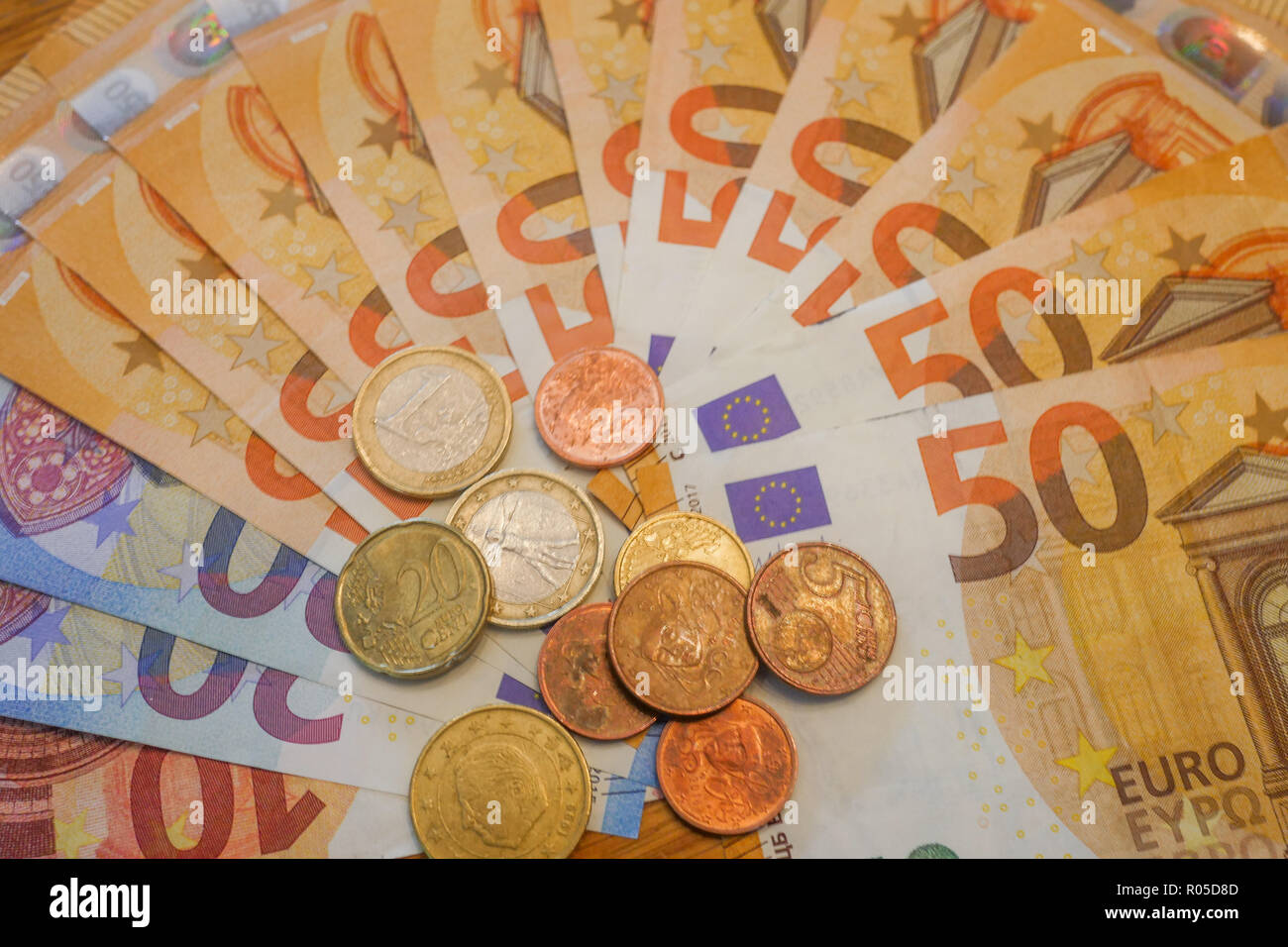 Euro banknotes and coins, Lyon, France Stock Photo - Alamy