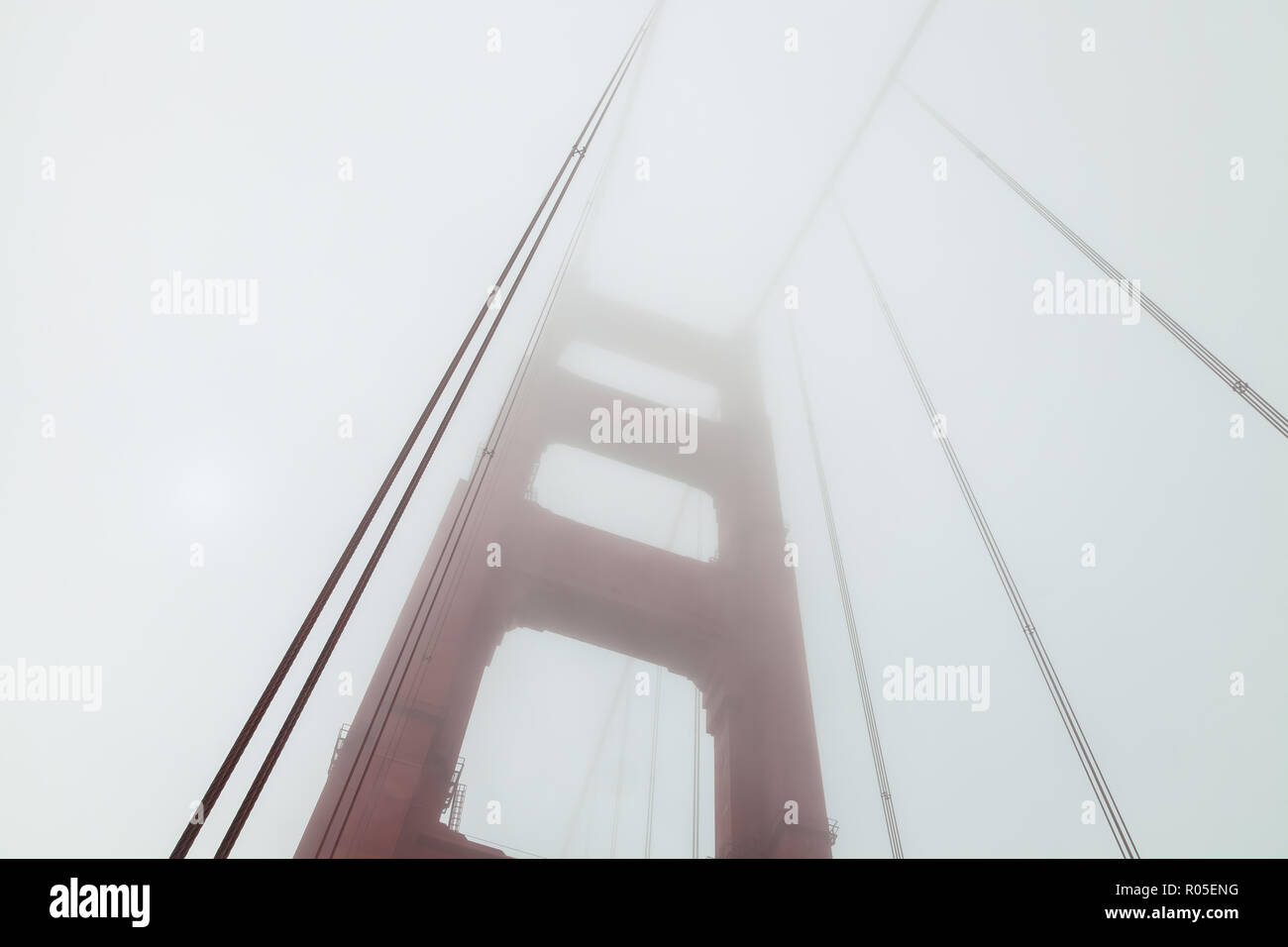Low camera angle shot at the tower structure of the Golden Gate Bridge ...