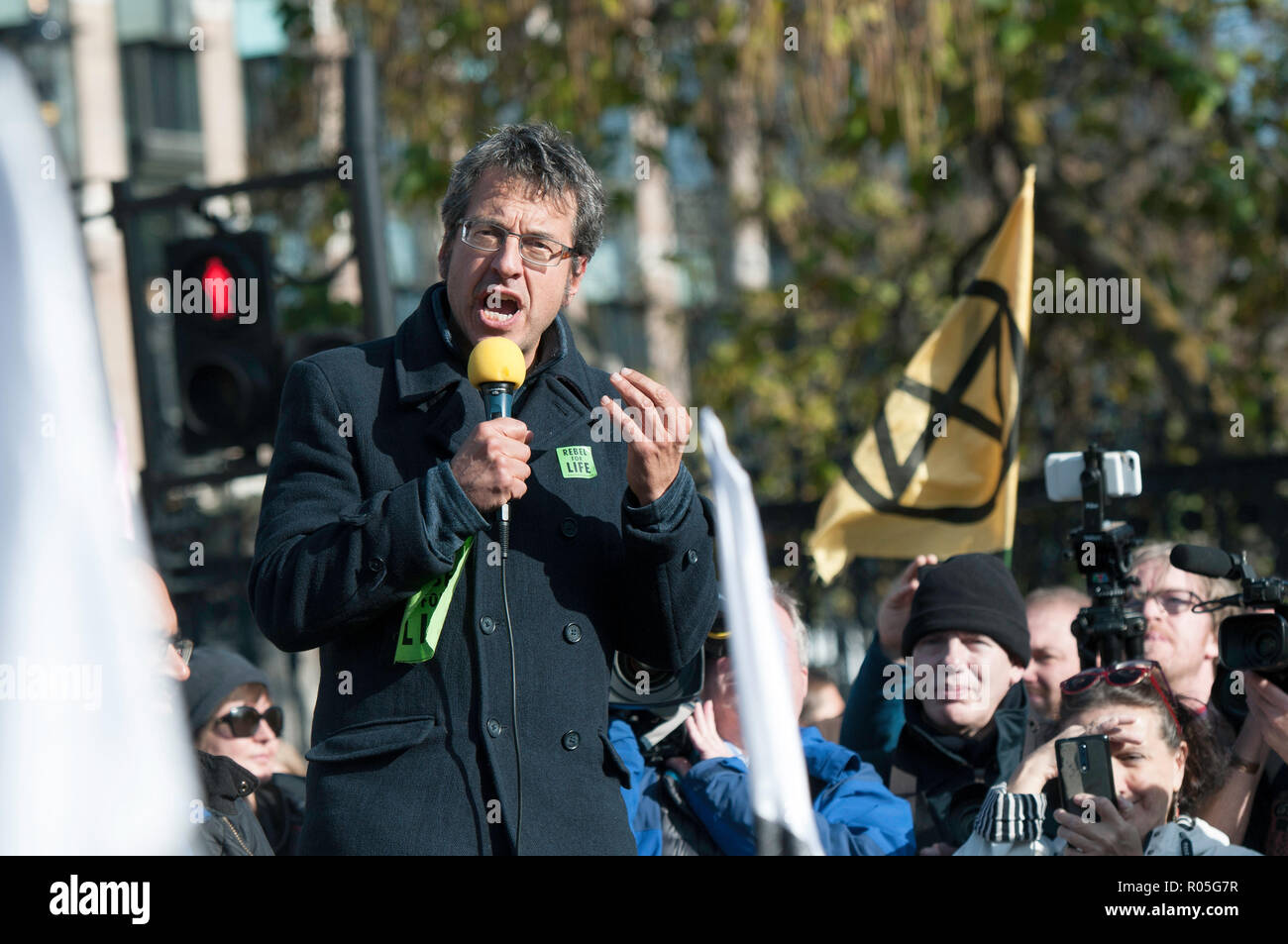 Guardian columnist George Monbiot seen speaking during the protest. The ...