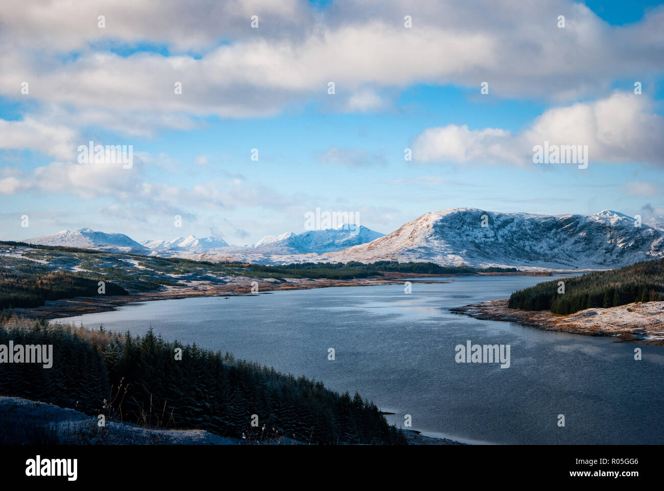 Icy mountaings, lake and forest surroundings in Scotland Stock Photo ...