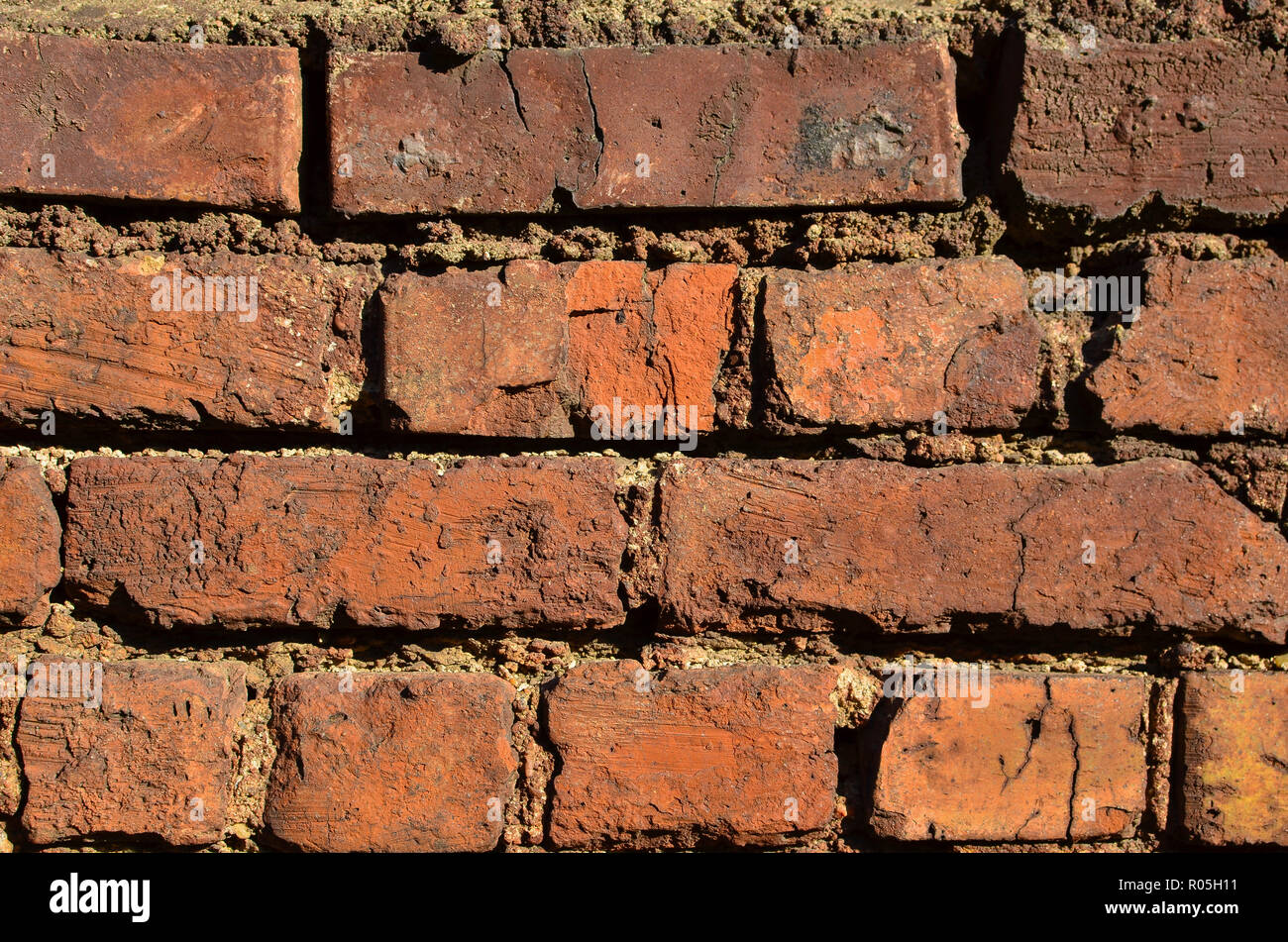 Red brick fence. Red brick wall texture background Stock Photo - Alamy