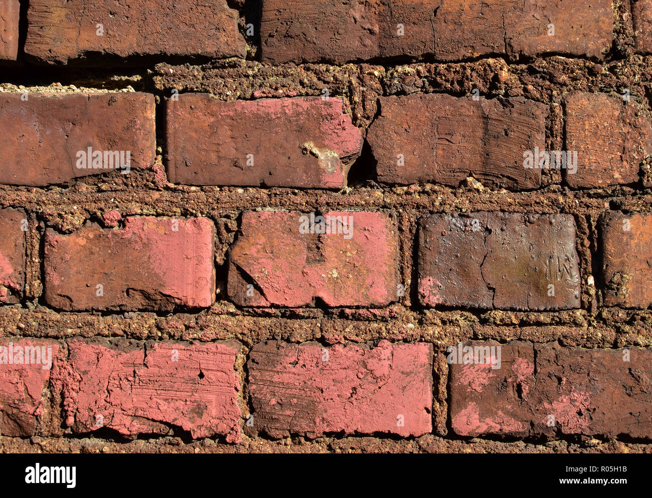 Red brick fence. Red brick wall texture background Stock Photo - Alamy