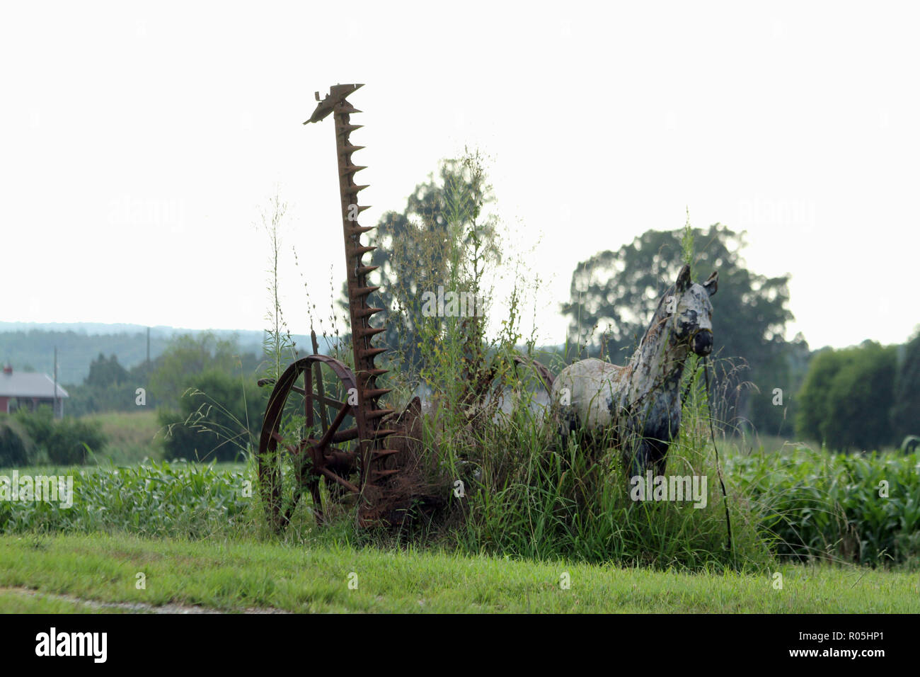 Vintage hay cutter displayed on a field in Virginia, USA Stock Photo ...