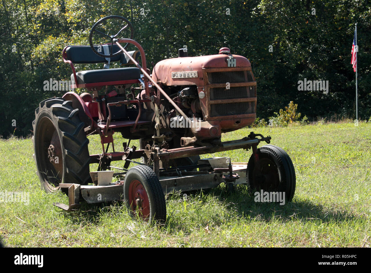 Tractor on field Stock Photo - Alamy