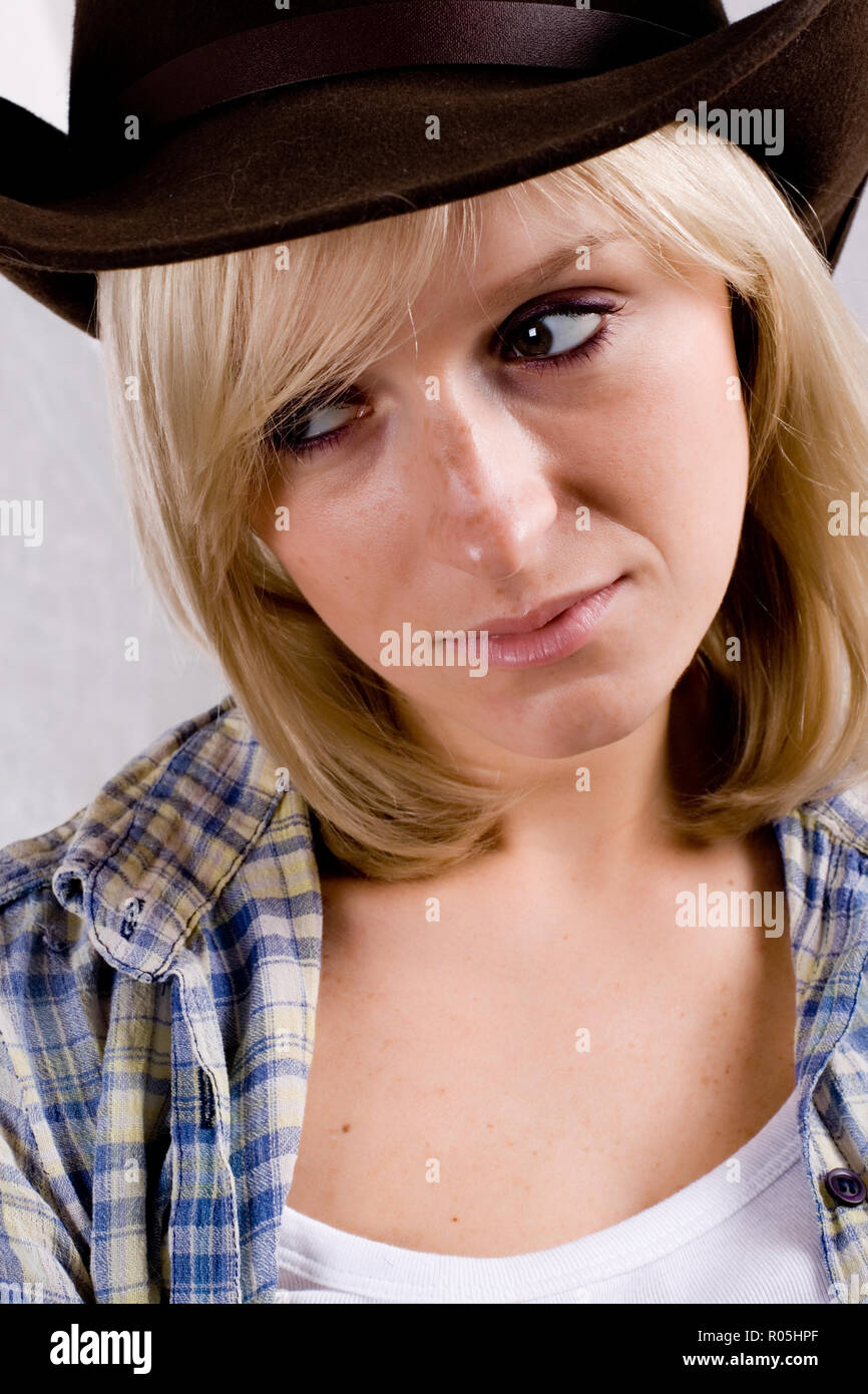 closeup portrait of pretty western woman in cowboy shirt and hat Stock ...