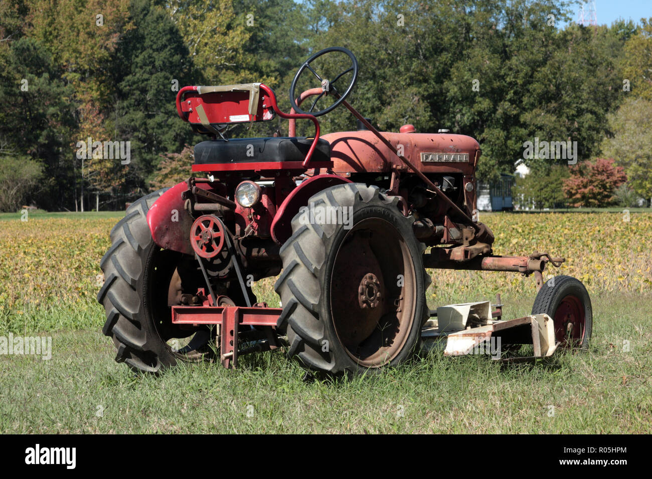 Tractor on field Stock Photo - Alamy