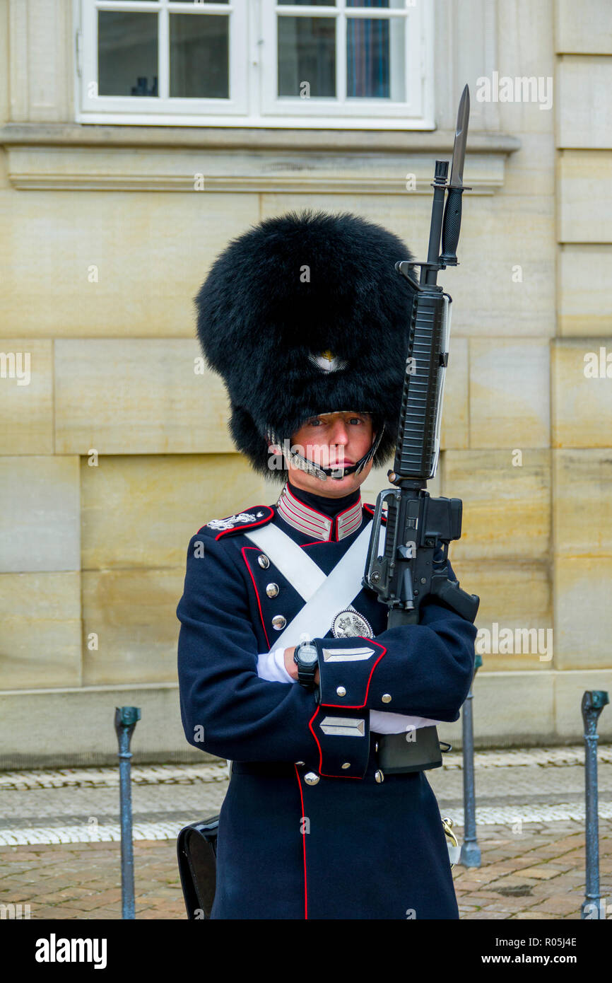 Honor guard soldier at Amalienborg Palace courtyard Copenhagen Denmark ...