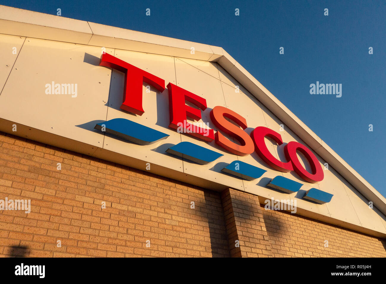 Tesco and brand name Sign in Dinnington, Rotherham Stock Photo - Alamy