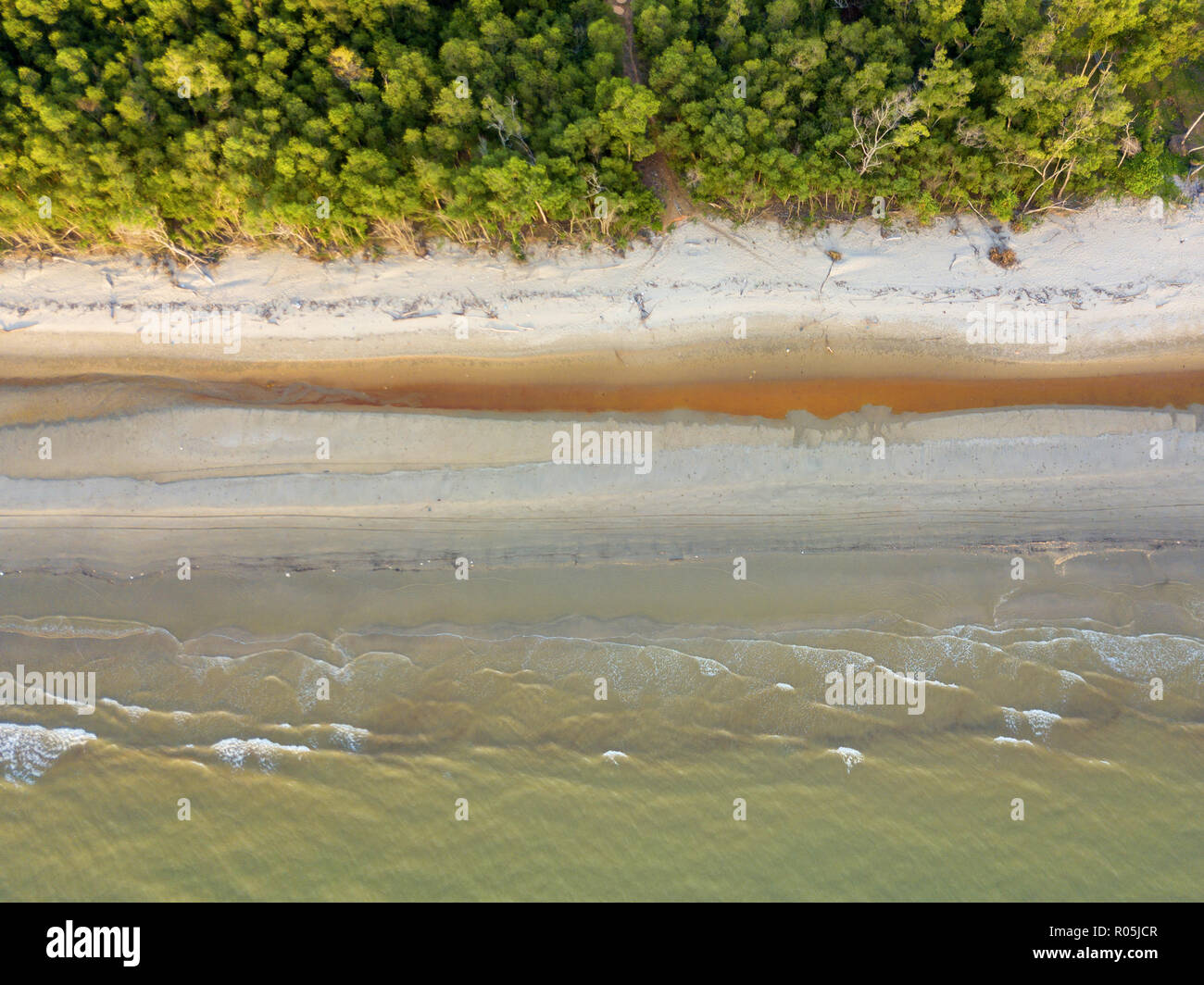 Aerial view of Sabandar Beach in Tuaran Sabah during sunset with white ...
