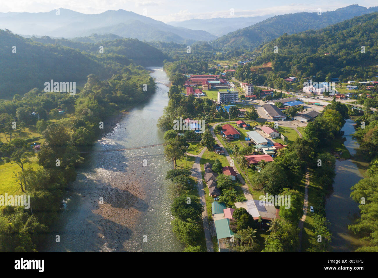 Aerial top angle helicopter drone view of rural town Kiulu Sabah ...