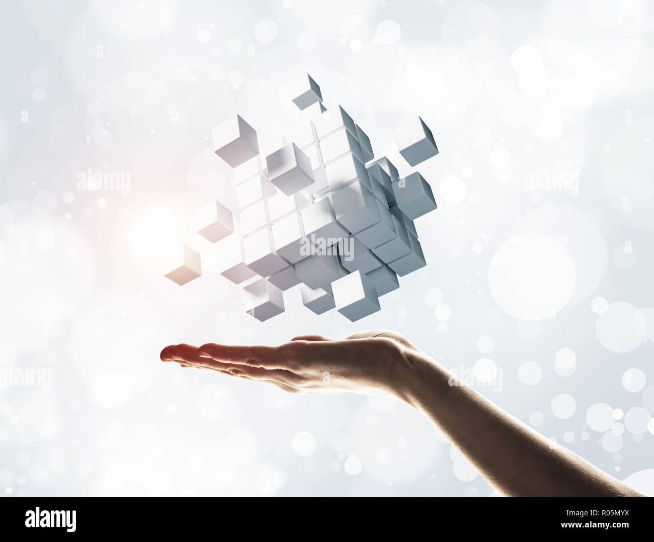 Cube white figure in male palm as symbol for integration. 3D ren Stock ...