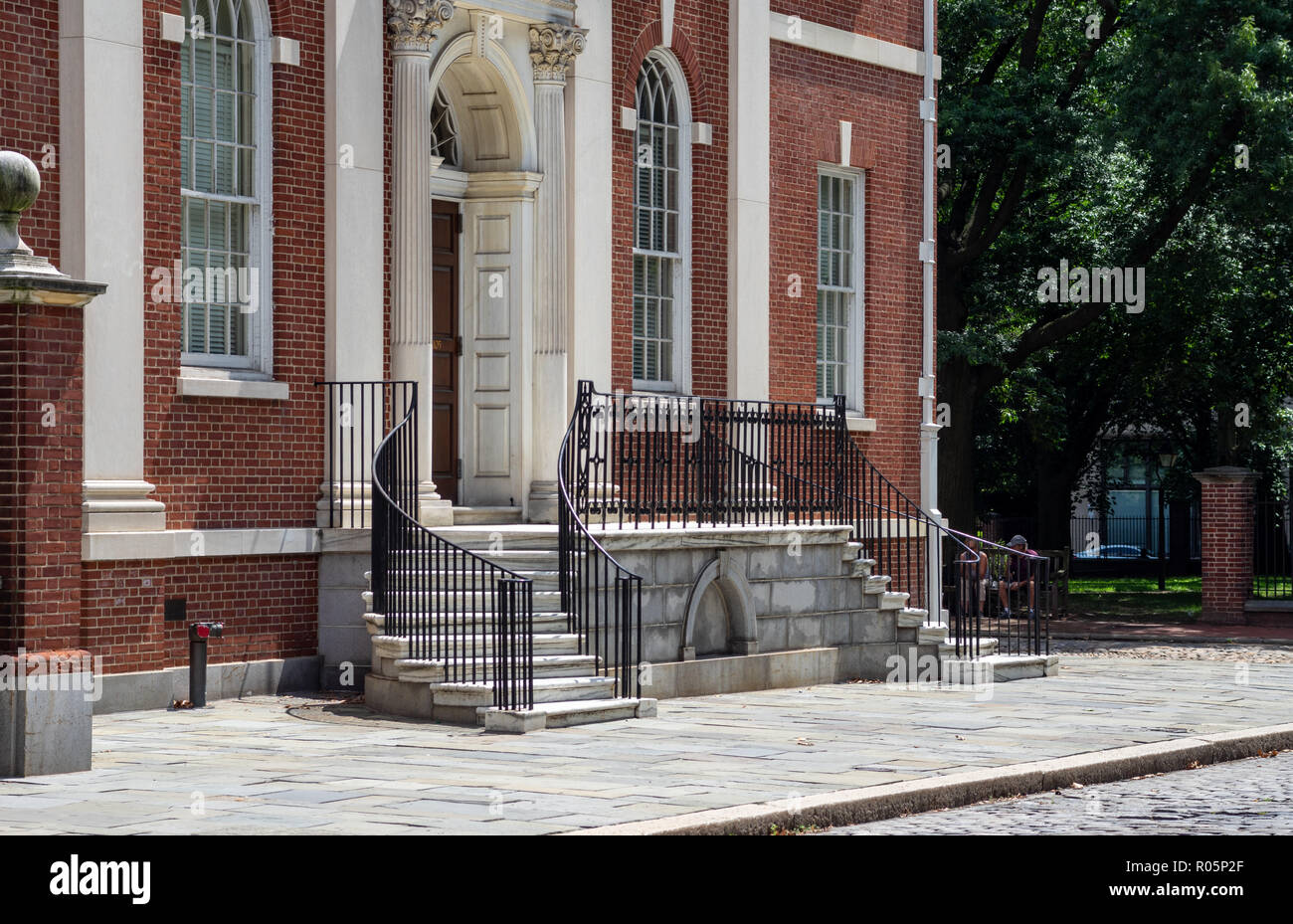 Curved stairway at the entrance of a historical building Stock Photo ...
