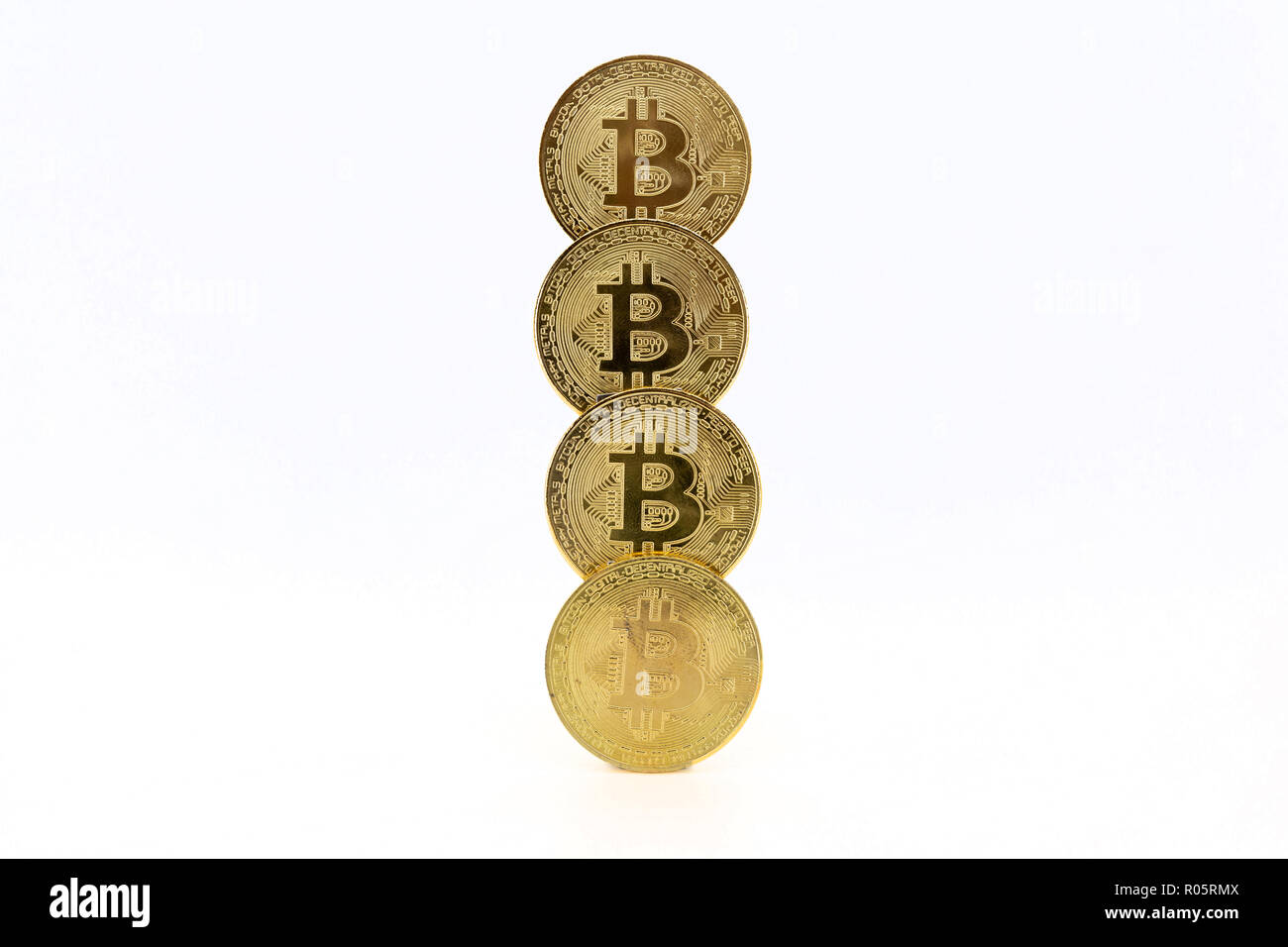 Bitcoin tokens isolated on white background. Cryptocurrency concept ...