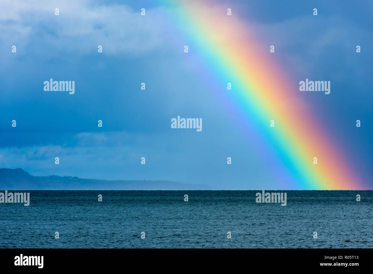 Rainbow and sea Stock Photo - Alamy