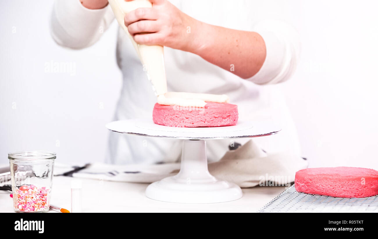 Step by step. Stacking layers together of pink birthday cake Stock ...