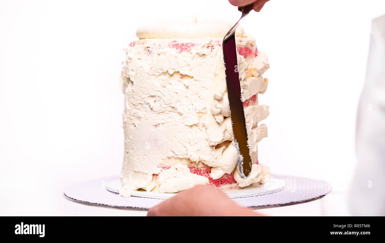 Step by step. Icing tall birthday cake with white buttercream icing ...