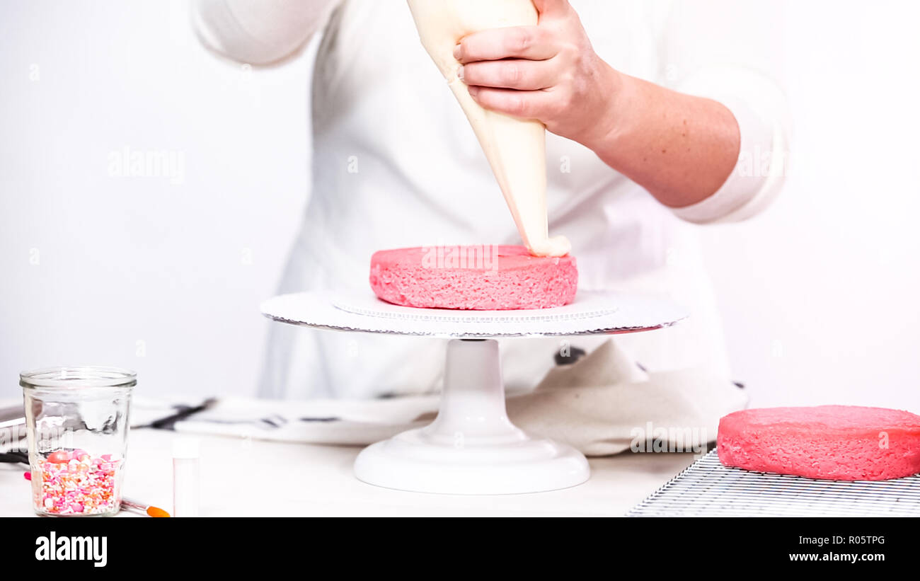 Step by step. Stacking layers together of pink birthday cake Stock ...