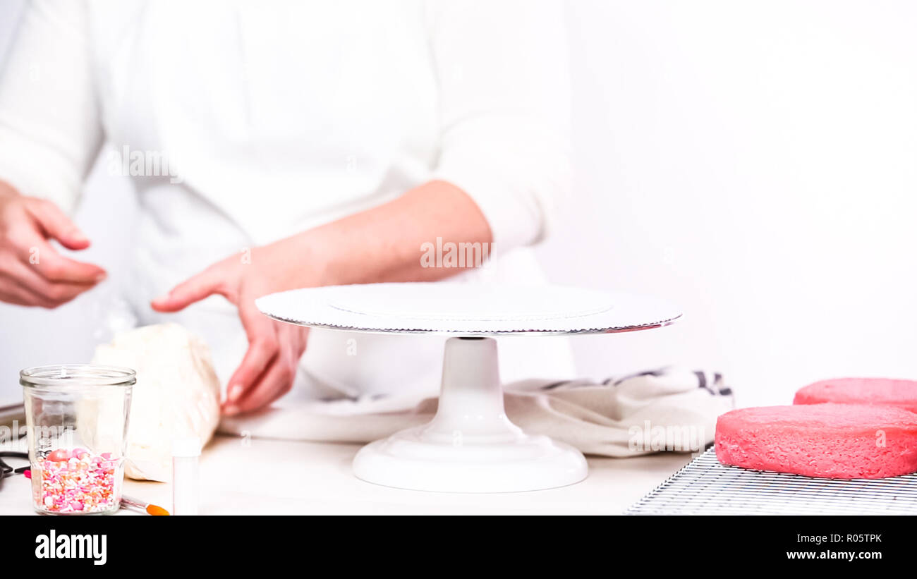 Step by step. Stacking layers together of pink birthday cake Stock ...