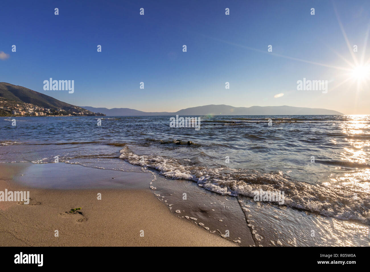 Coastline of the beach on the forefront background Stock Photo - Alamy