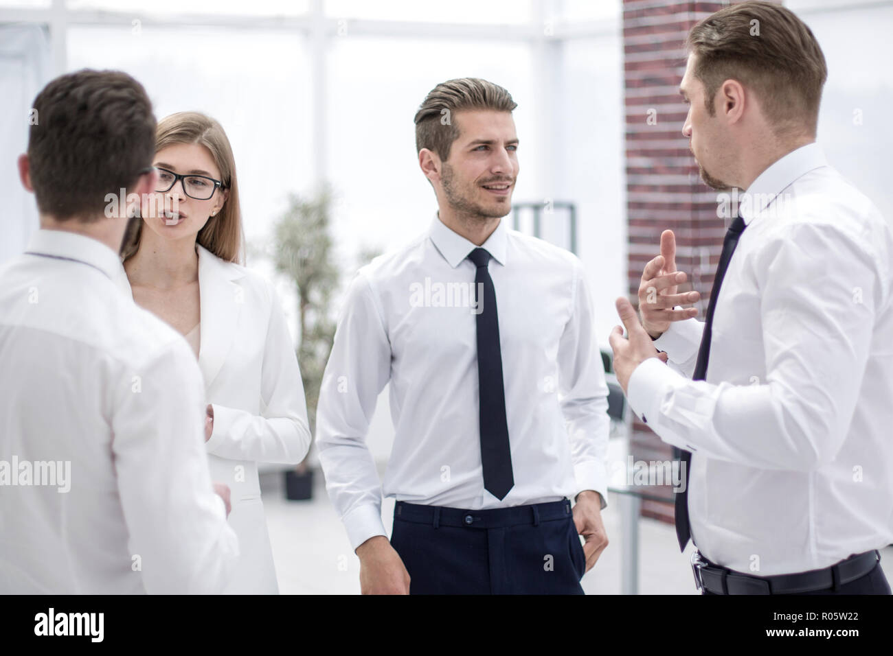 company employees discussing current tasks.the concept of teamwork ...