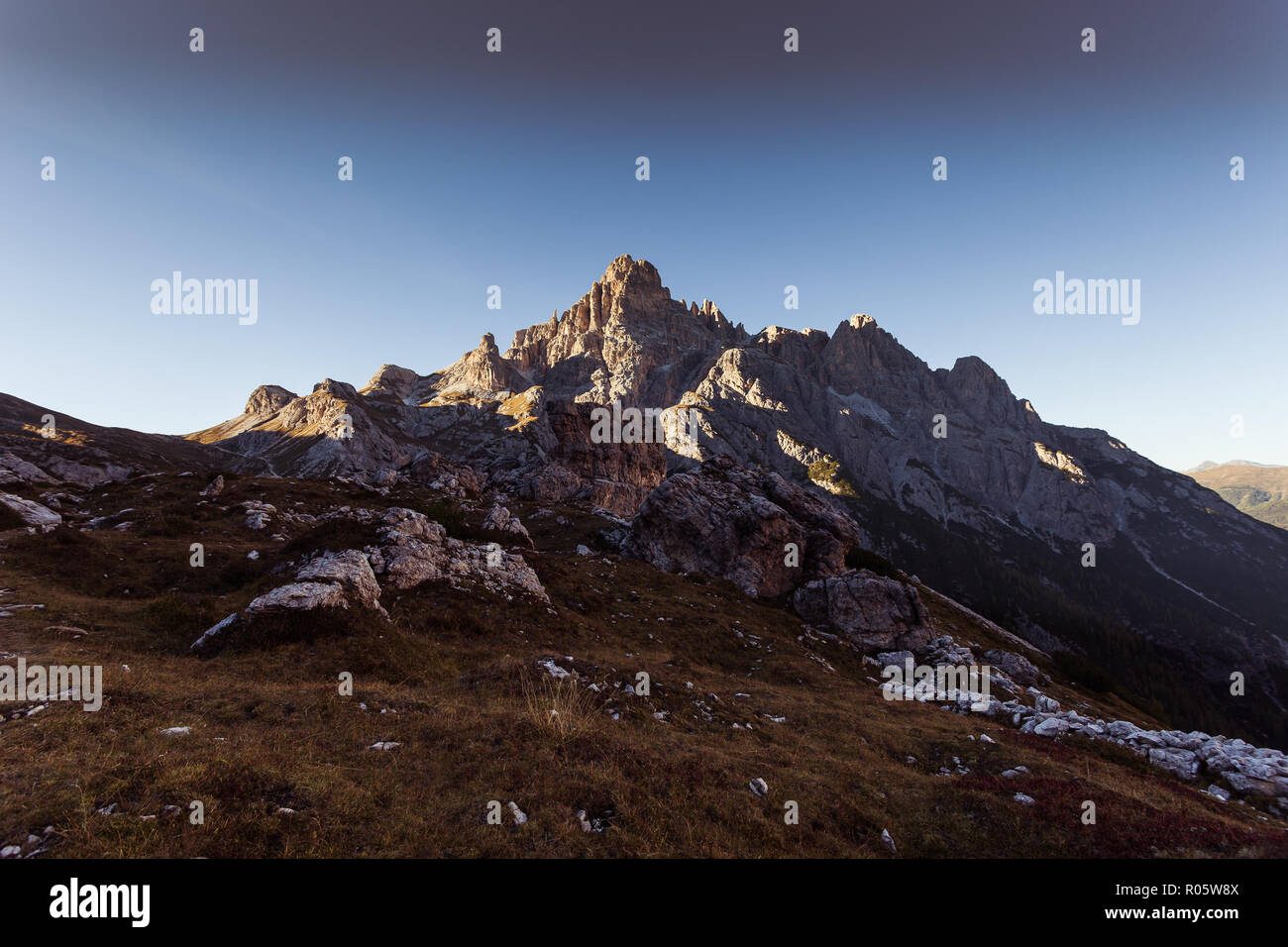 Awesome dolomite Tre Scarperi peaks at sunset, South Tyrol, Italy Stock ...