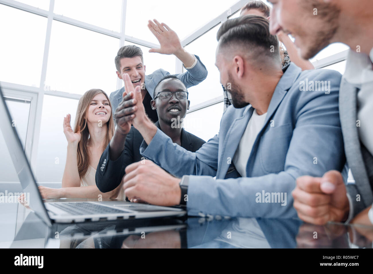Business meeting in office with laptop computer Stock Photo - Alamy