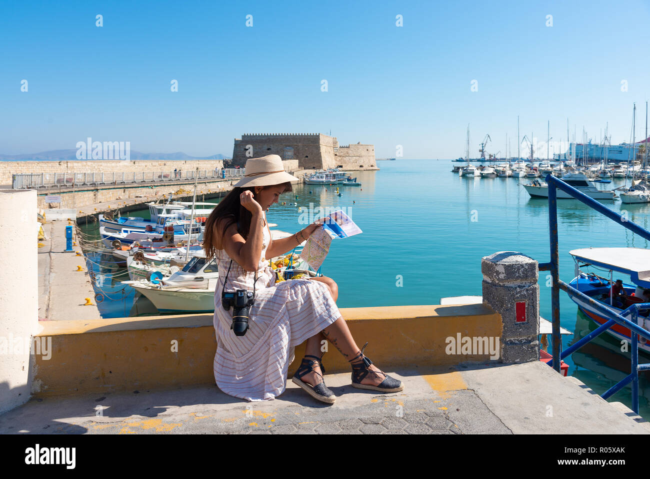Travelling tourist woman on vacation in Heraklion Crete walking at the ...