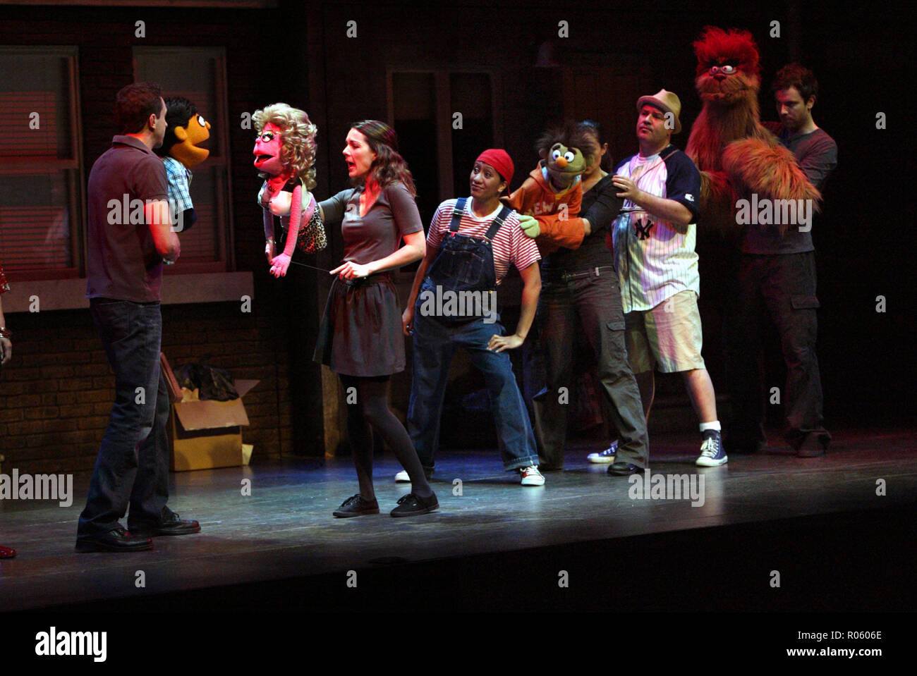 Cast and puppets from the adult-oriented 'Avenue Q' puppet show in a ...