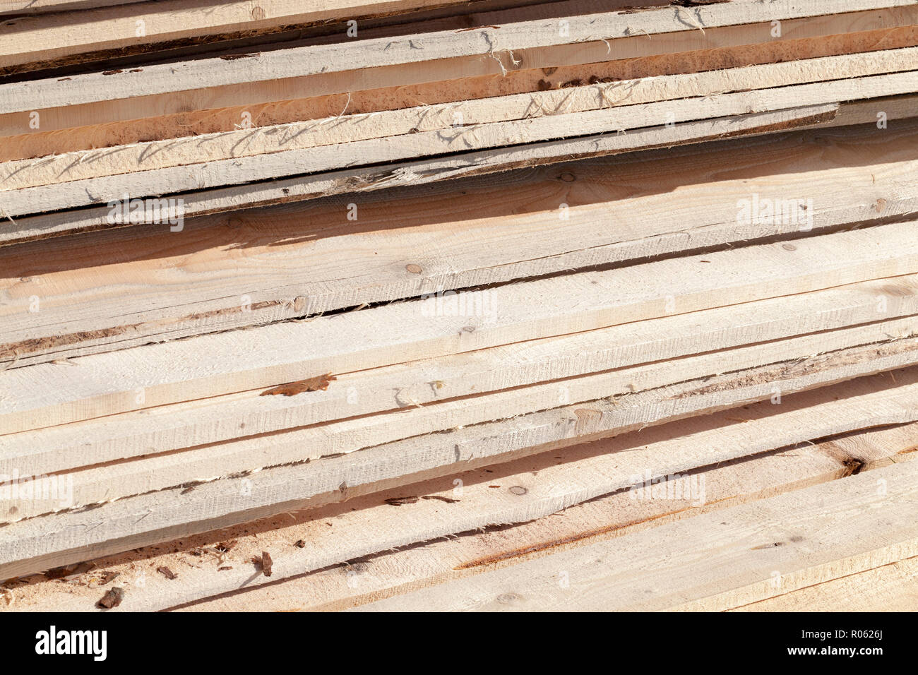 sawn rough board from a pine trunk, building material for a house ...