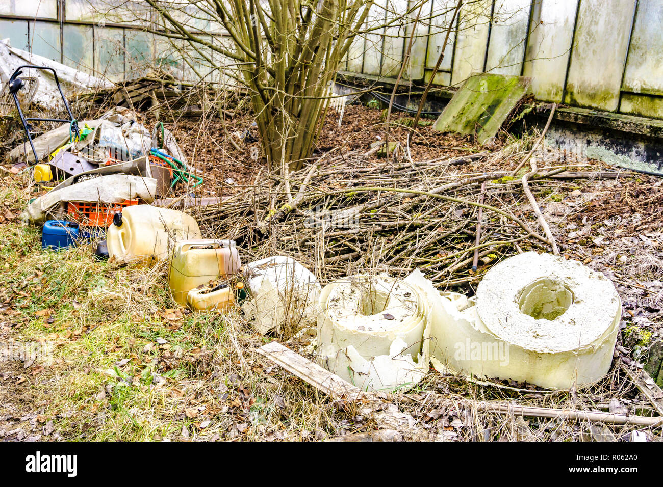 Environmental pollution, old wasted trash in nature Stock Photo - Alamy