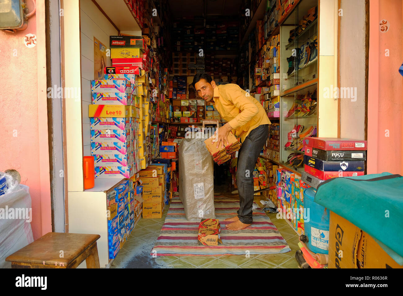 Faces of an Indian people and street vendor along the street of Manda ...